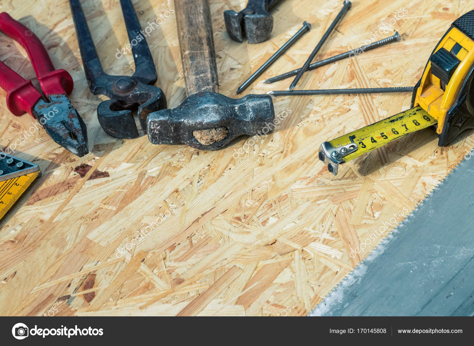 Tools set on osb panel with copy space. Carpenter workplace on wooden ...