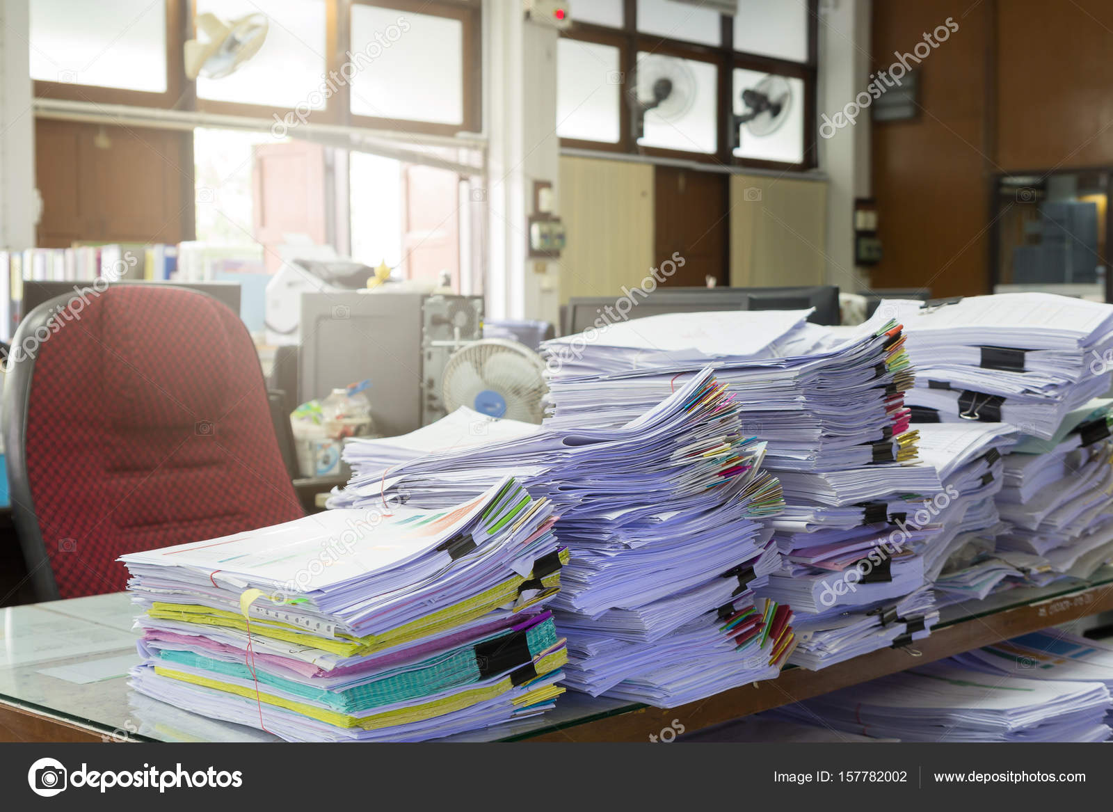 Pile Of Papers On Desk