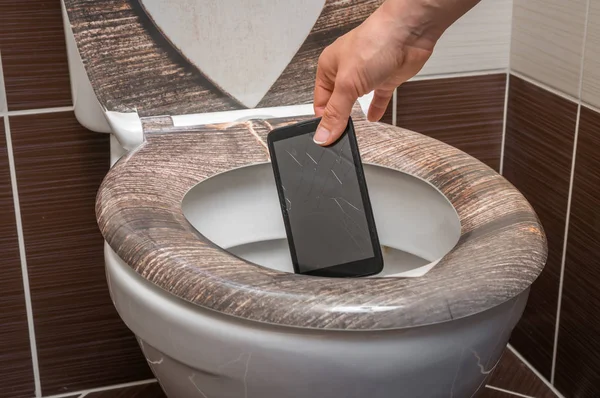 Cellphone on toilet Stock Photos, Royalty Free Cellphone on toilet ...