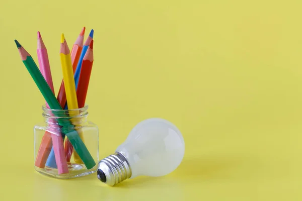 Light bulb and colored pencils — Stock Photo © goccedicolore #42154101