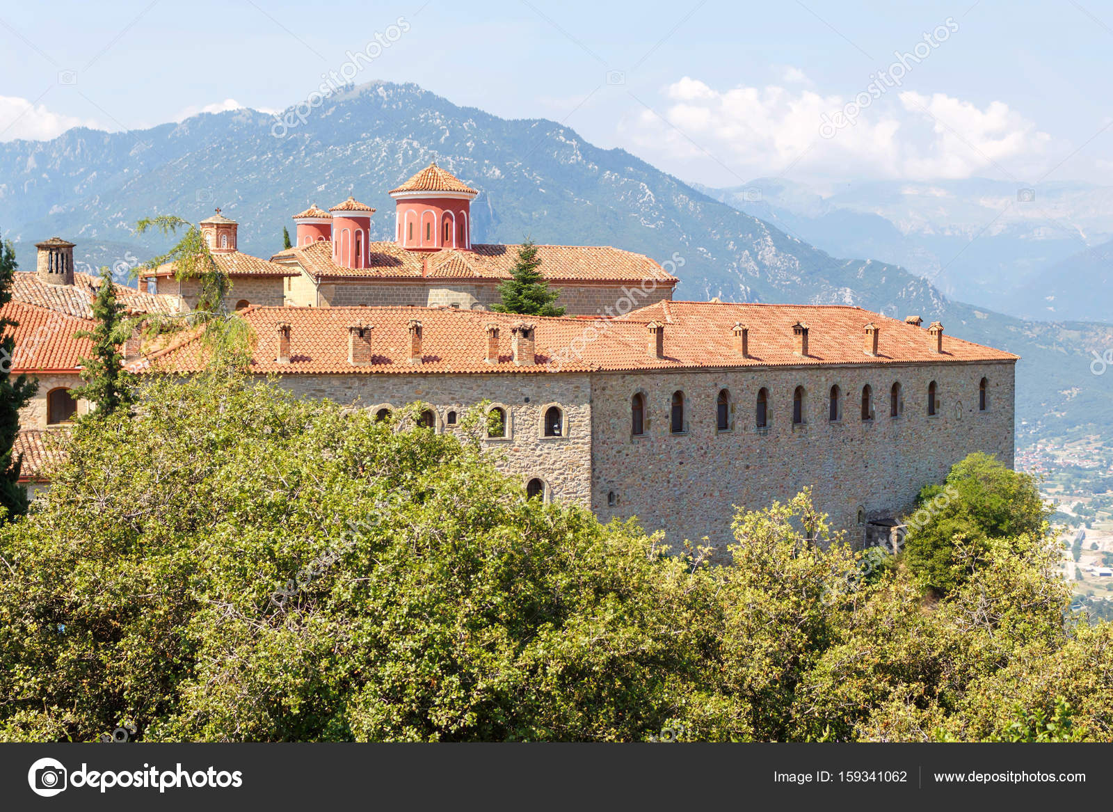 Aerial sunset view on monastery at coast of mountains Stock Photo by ...