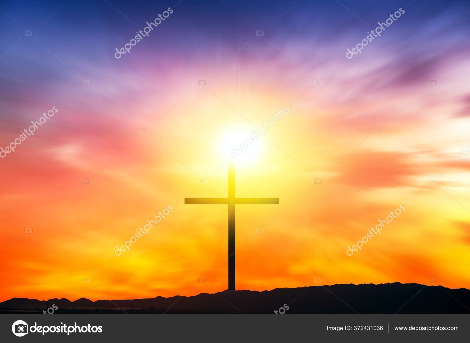 Cross With Sun In Background