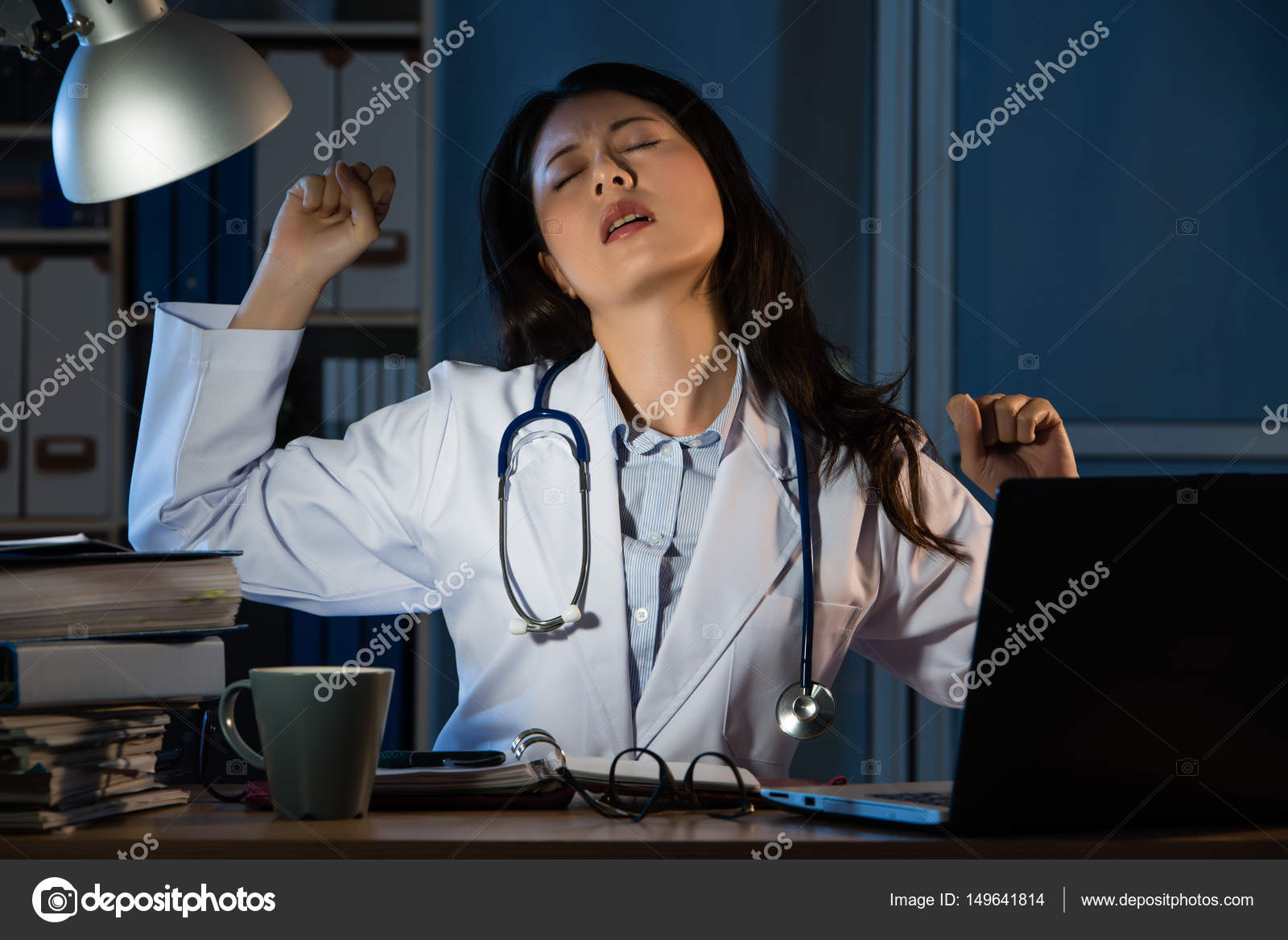 Young doctor having bad diagnosis and stretch Stock Photo by ...
