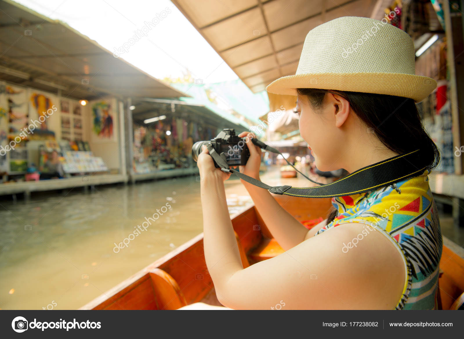 Tourist using camera recording local vendor view Stock Photo by ...