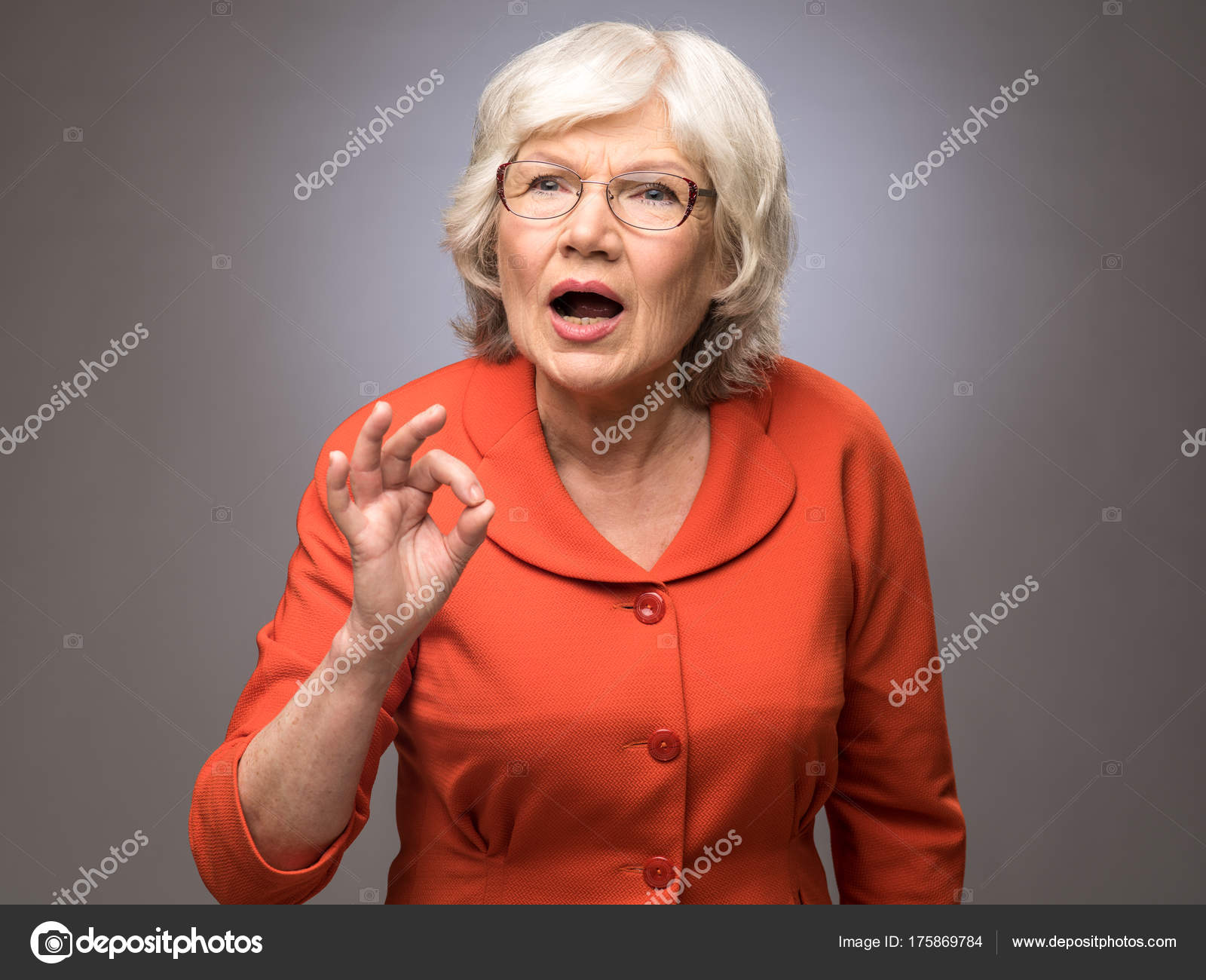 Senior lady showing ok sign Stock Photo by ©ALotOfPeople 175869784