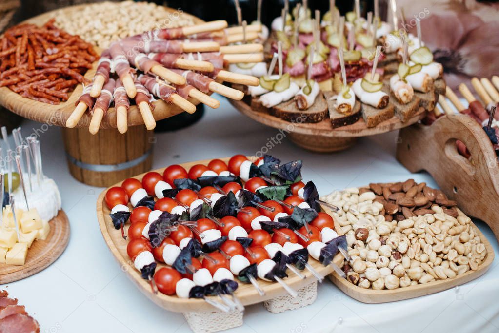 Table with food, tapas bar with spanish cuisine, cured meat, cheese and ...