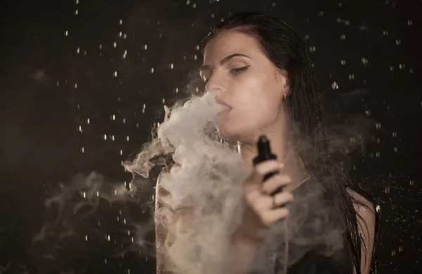 Beautiful woman vaping Stock Photos, Royalty Free Beautiful woman ...