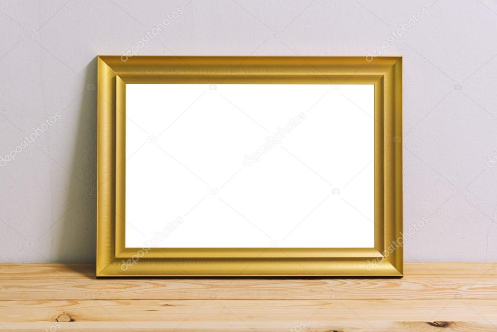 Gold Photo frames on the wood table. — Stock Photo © karn2608 #125207032