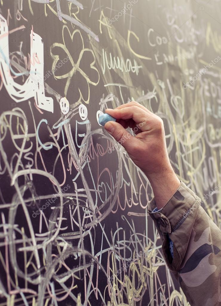 Hand writing with chalk on full filled board. Close up — Stock Photo ...