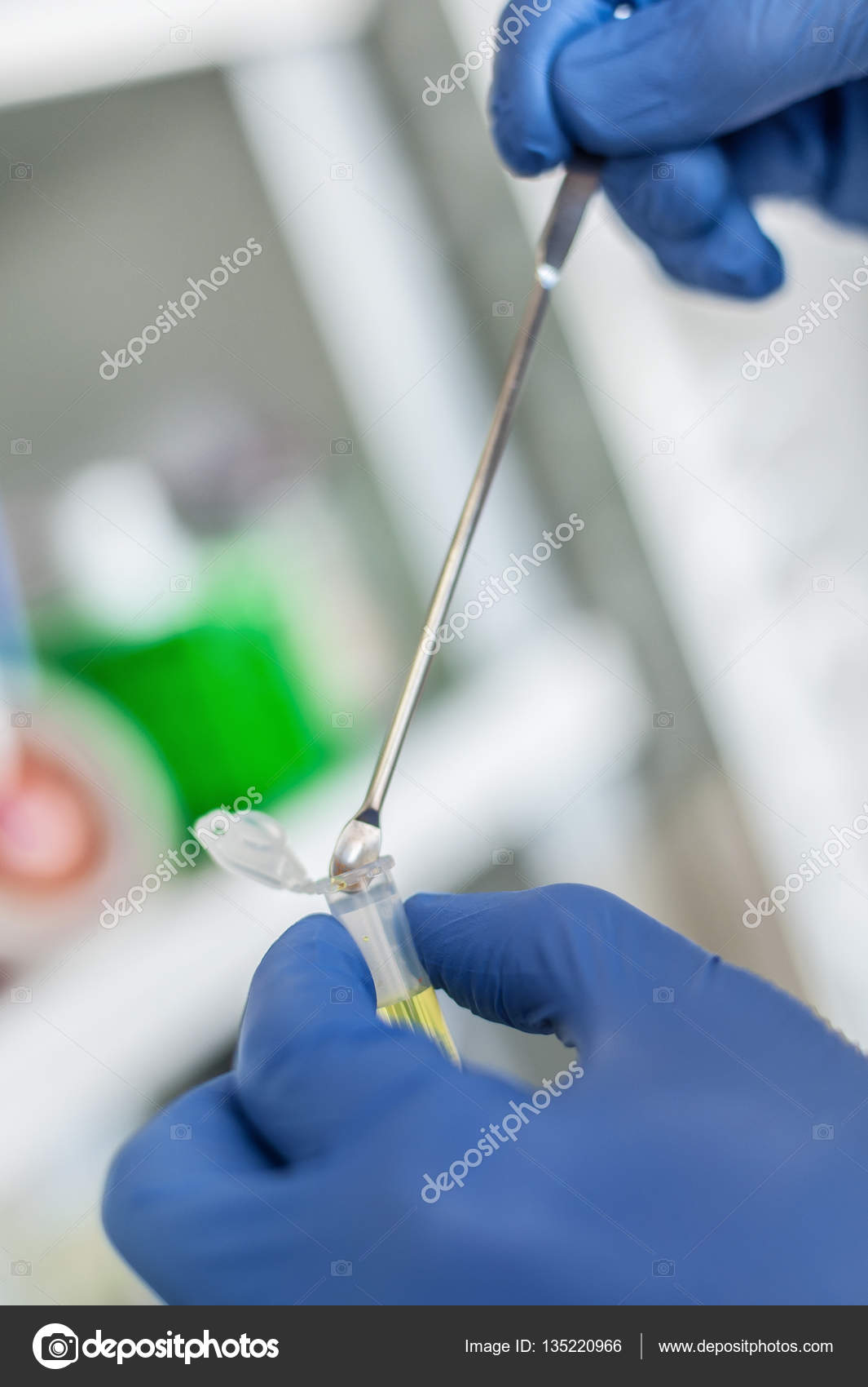 Laboratory technician take a sample with chemistry spoon Stock Photo by ...