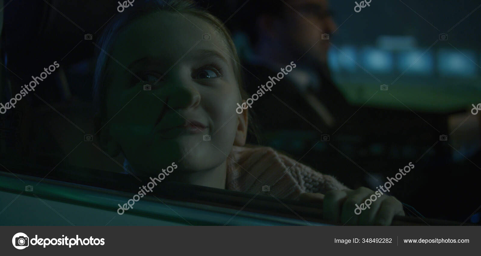 Girl pushing face against car window — Stock Photo © EvgeniyShkolenko ...