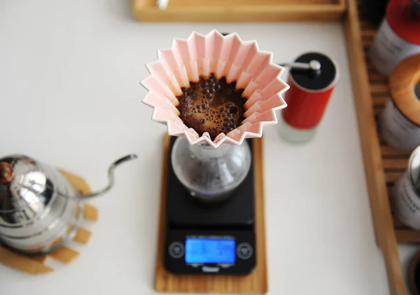 Alternative manual brewing. Pink origami dripper with paper wave filter ...