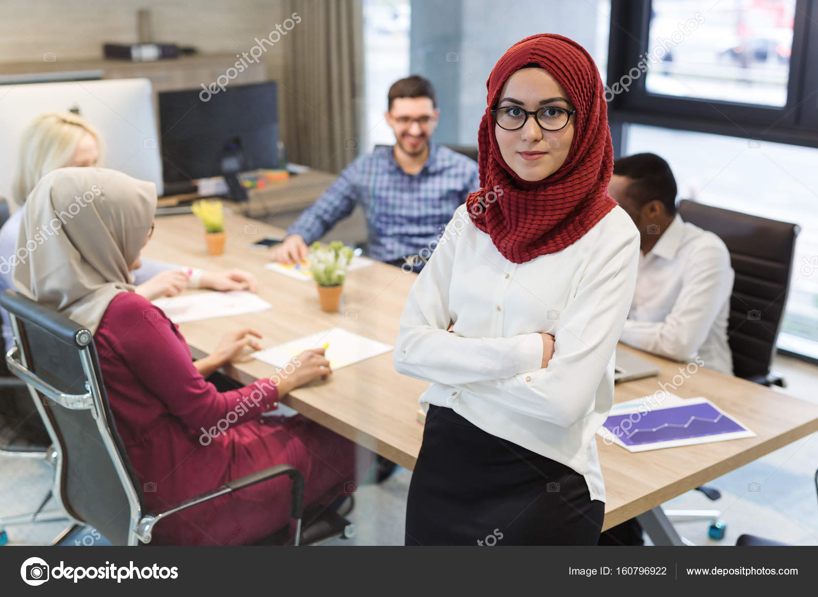 Multi-Cultural business team in office — Stock Photo © Myvisuals #160796922