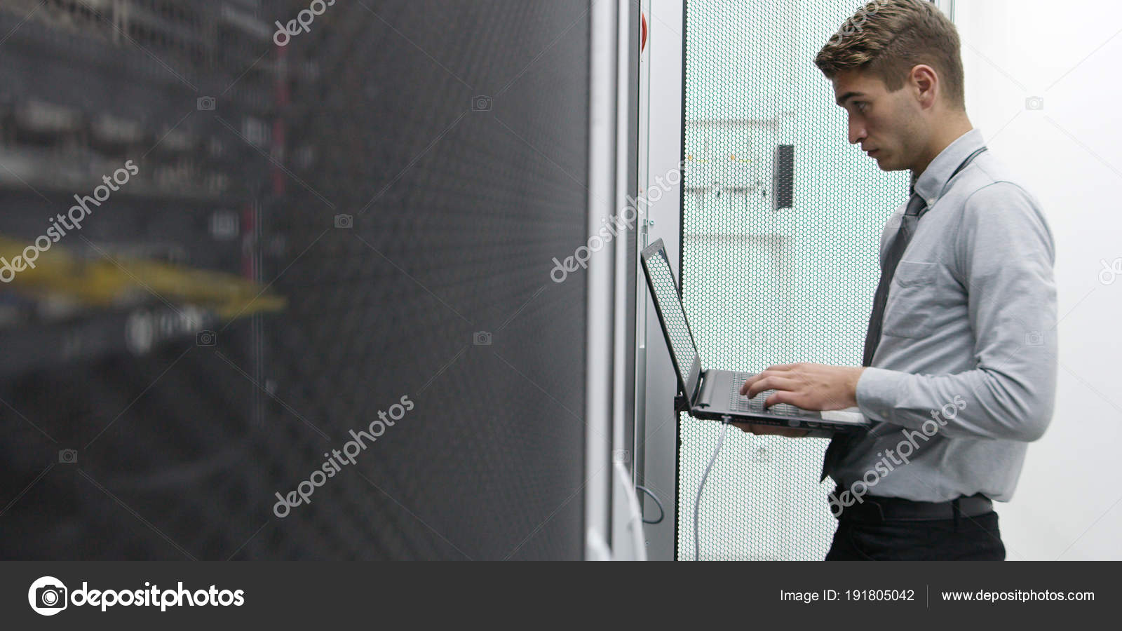 Expert Checking Supercomputer Server Stock Photo by ©Myvisuals 191805042