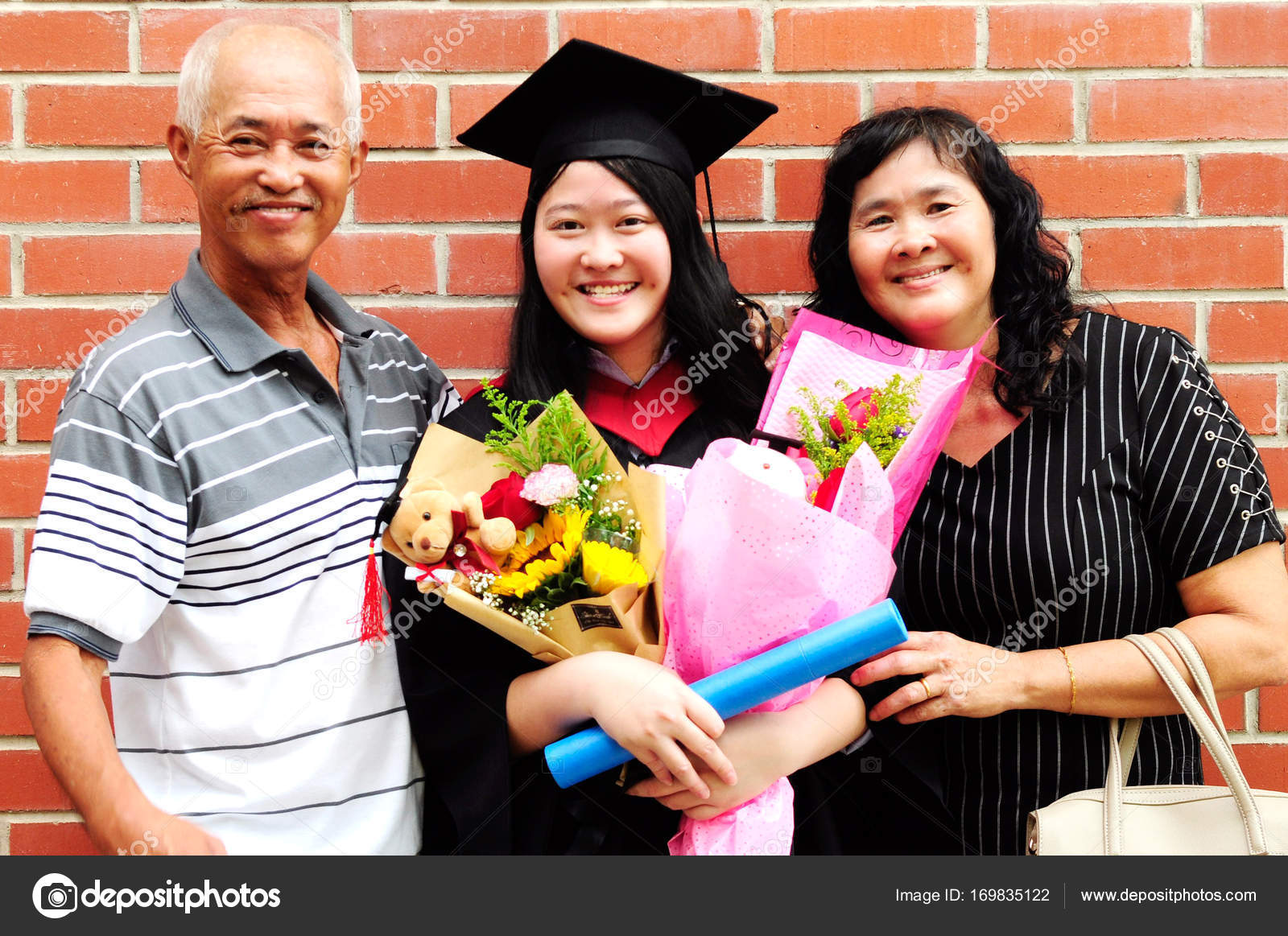 Happy Asian graduation — Stock Photo © yongtick #169835122