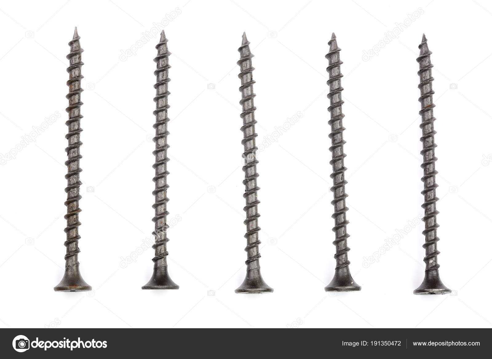 Black screws isolated on white background closeup. Top view. Stock ...