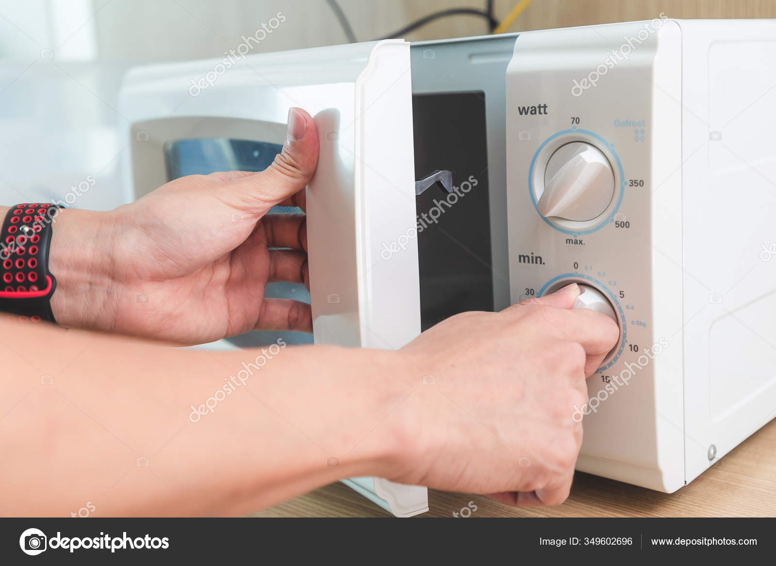Woman's Hands Closing Microwave Oven Door Preparing Food Microwave ...