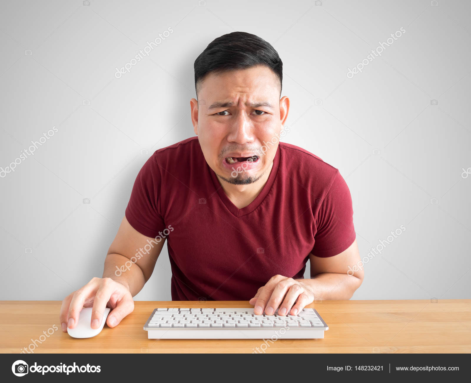 Man Crying At Computer