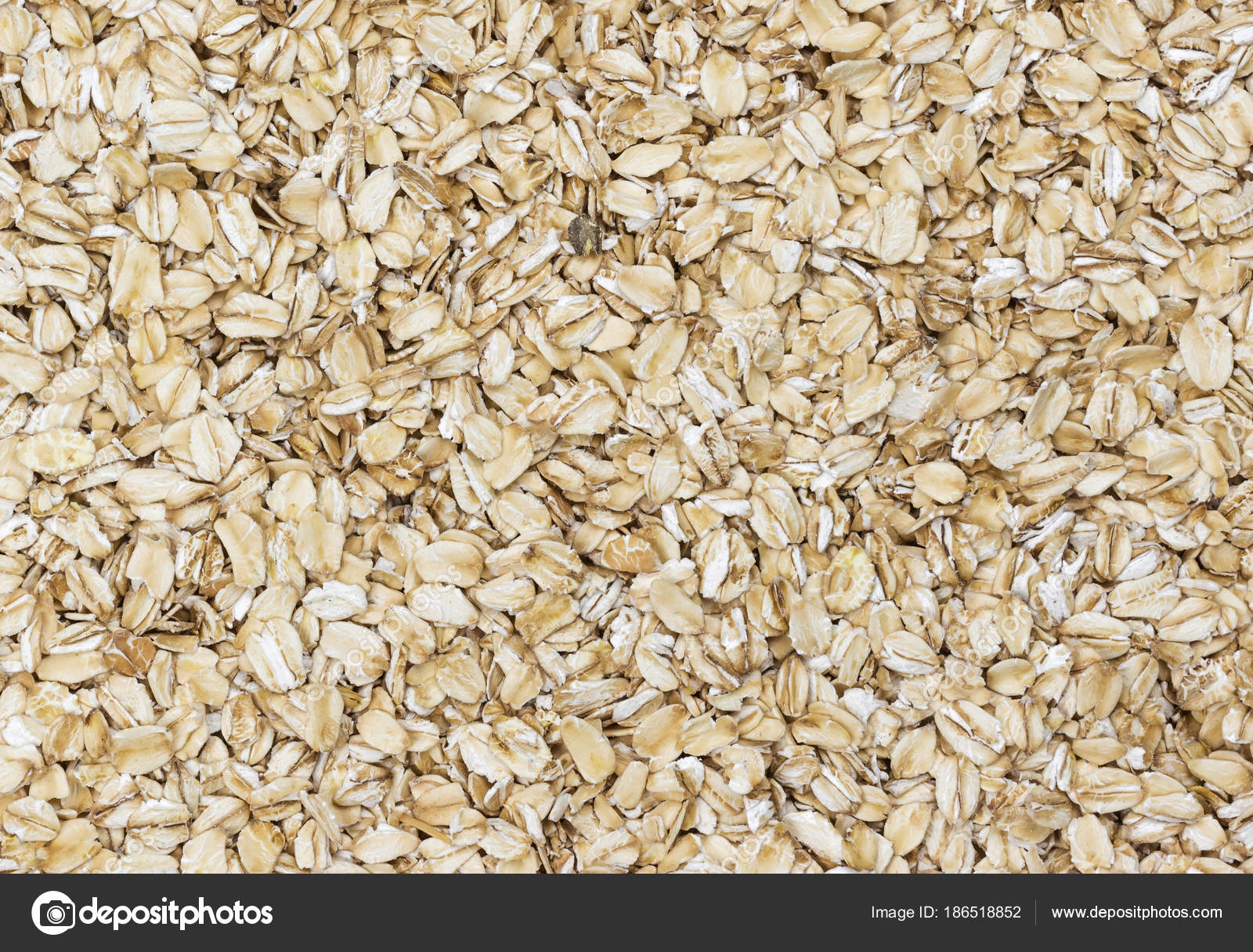 Oat flakes grain texture Stock Photo by ©xamtiw 186518852