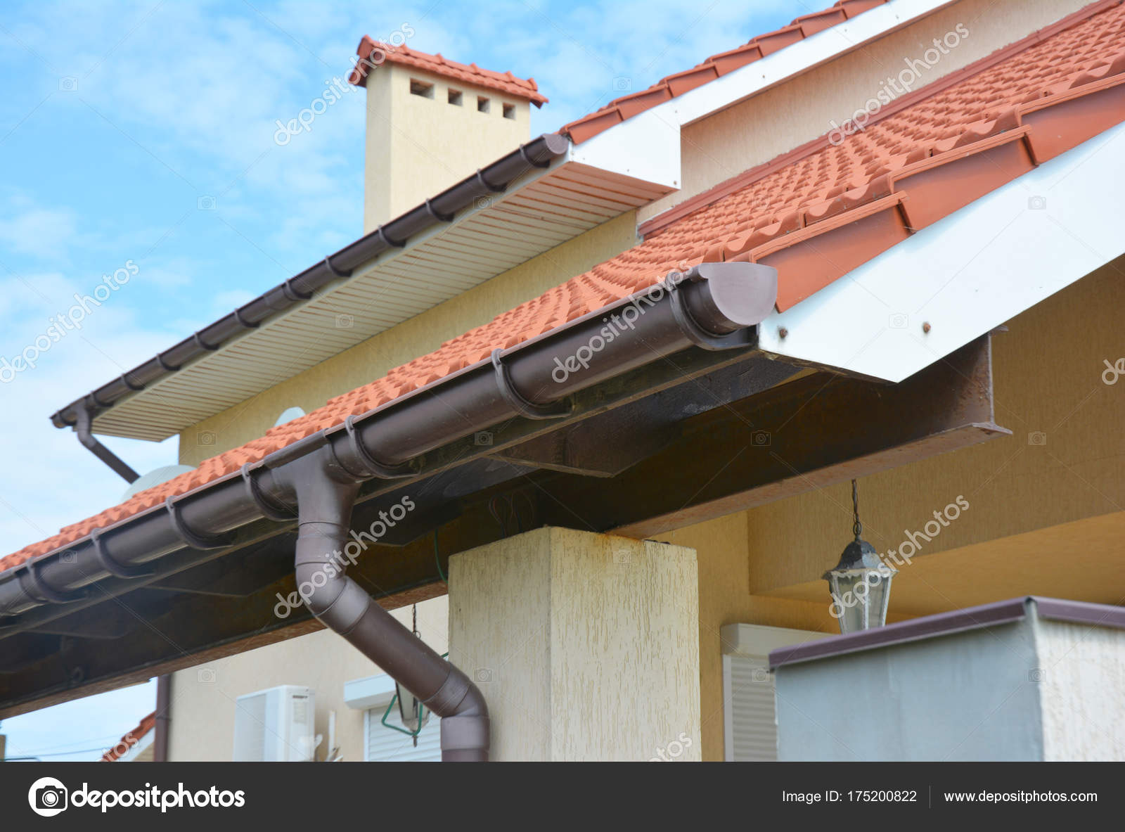 Close up on rain gutter pipeline system with holders and gutter ...