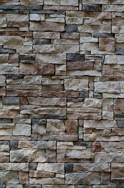 Cladding texture of a stone wall, background of natural stone materials ...