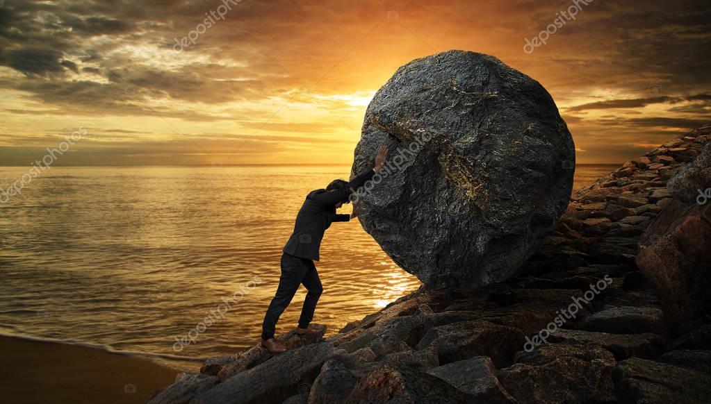Business man pushing large stone up to hill , Business heavy tas ...
