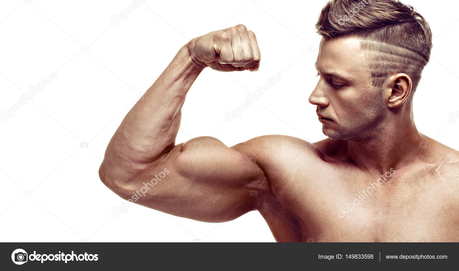 Muscular super-high level handsome man posing on white background ...
