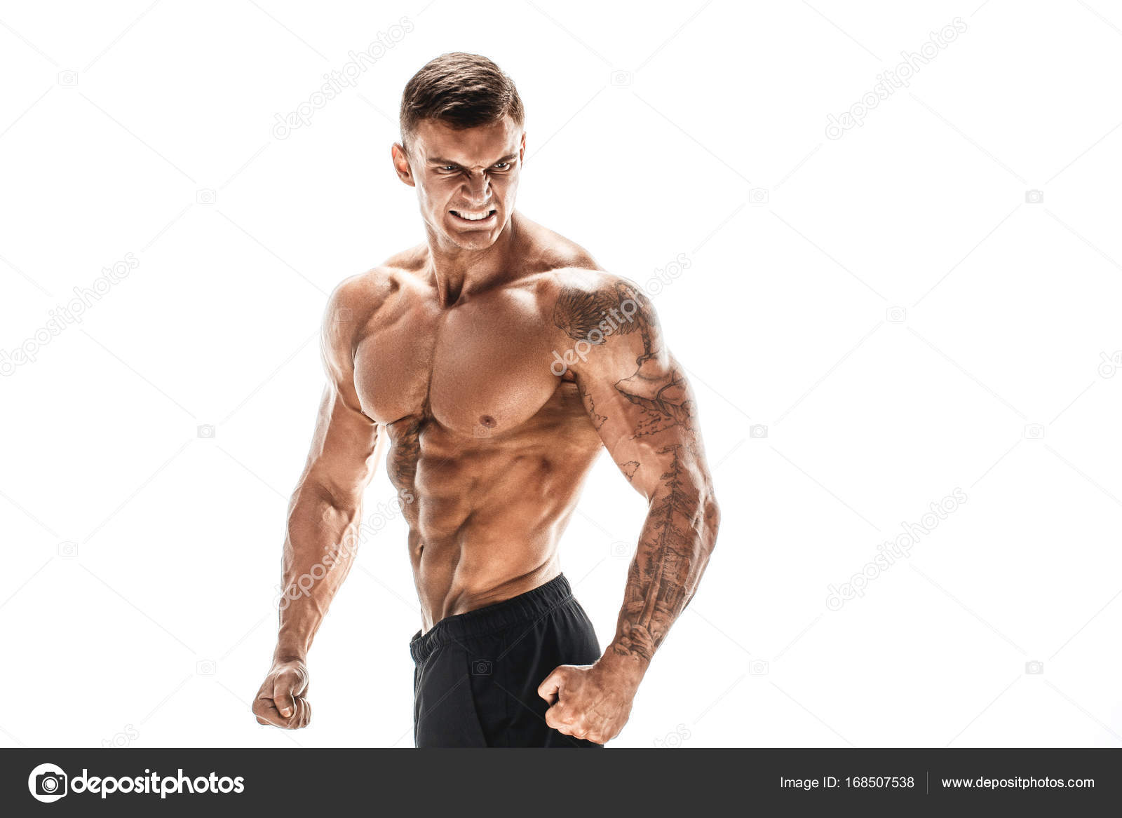 Muscular super-high level handsome man posing on white background Stock ...