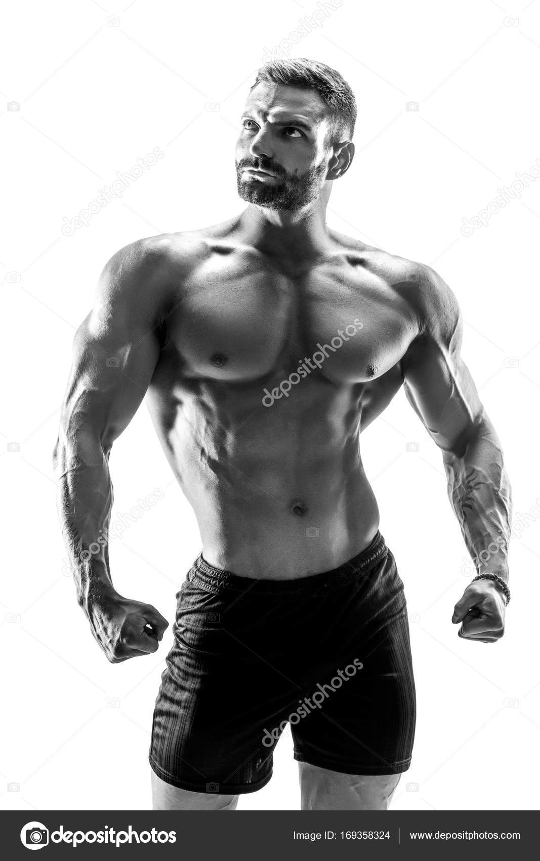 Bodybuilder showing his muscles isolated on a white — Stock Photo ...