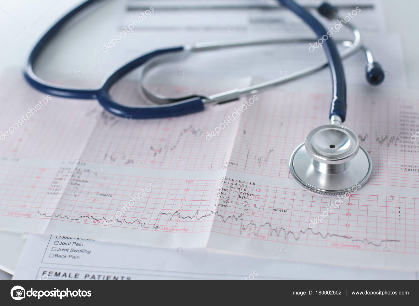 Docter workplace with a stethoscope Cardiogram chart with medical table ...