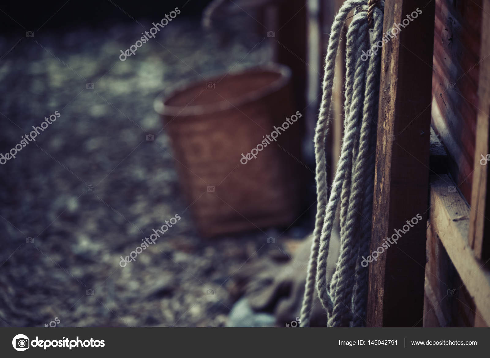 With rustic rope and bucket Stock Photo by ©nd3000 145042791