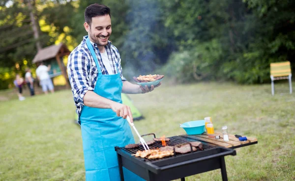 Man grilling Stock Photos, Royalty Free Man grilling Images | Depositphotos