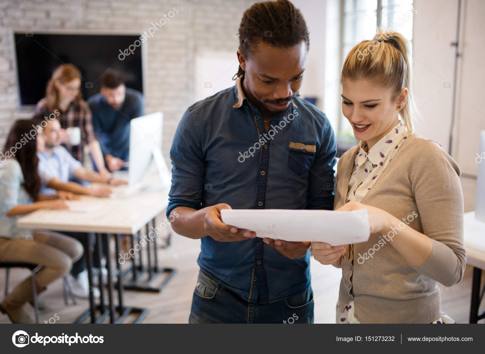 Company employees working in office — Stock Photo © nd3000 #151273232