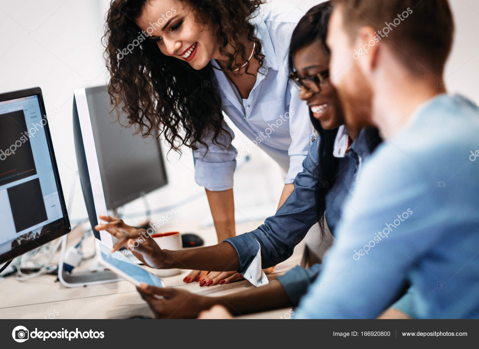 Software engineers working on project and programming in company ...