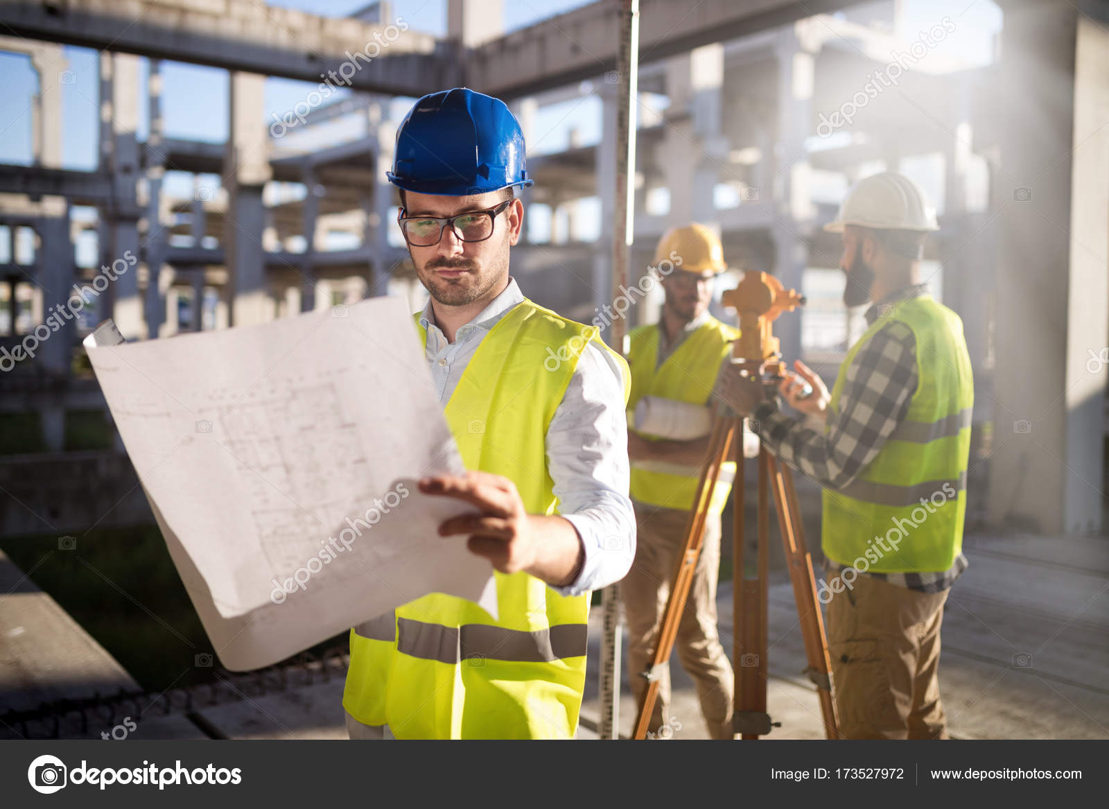 Portrait of construction engineers working Stock Photo by ©nd3000 173527972