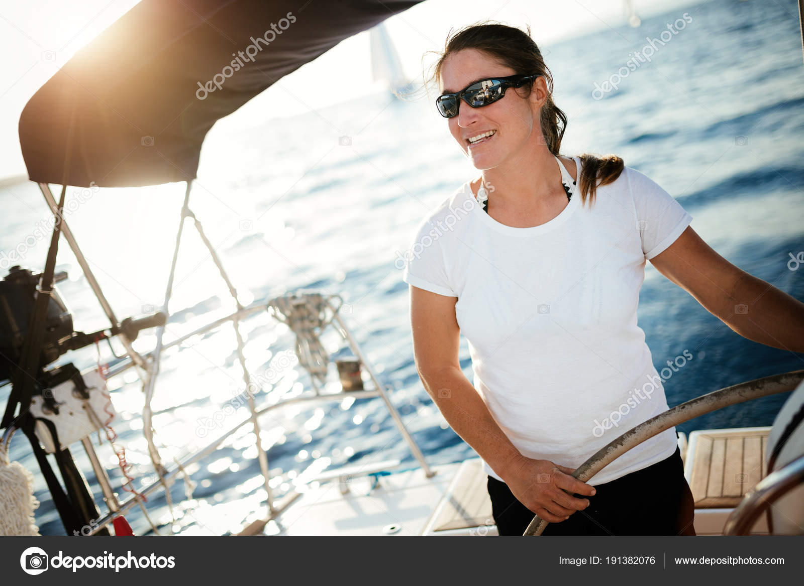 Attractive Strong Woman Sailing Her Sail Boat Stock Photo by ©nd3000 ...