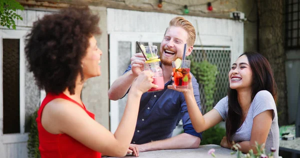 Friends drinking outside Stock Photos, Royalty Free Friends drinking ...