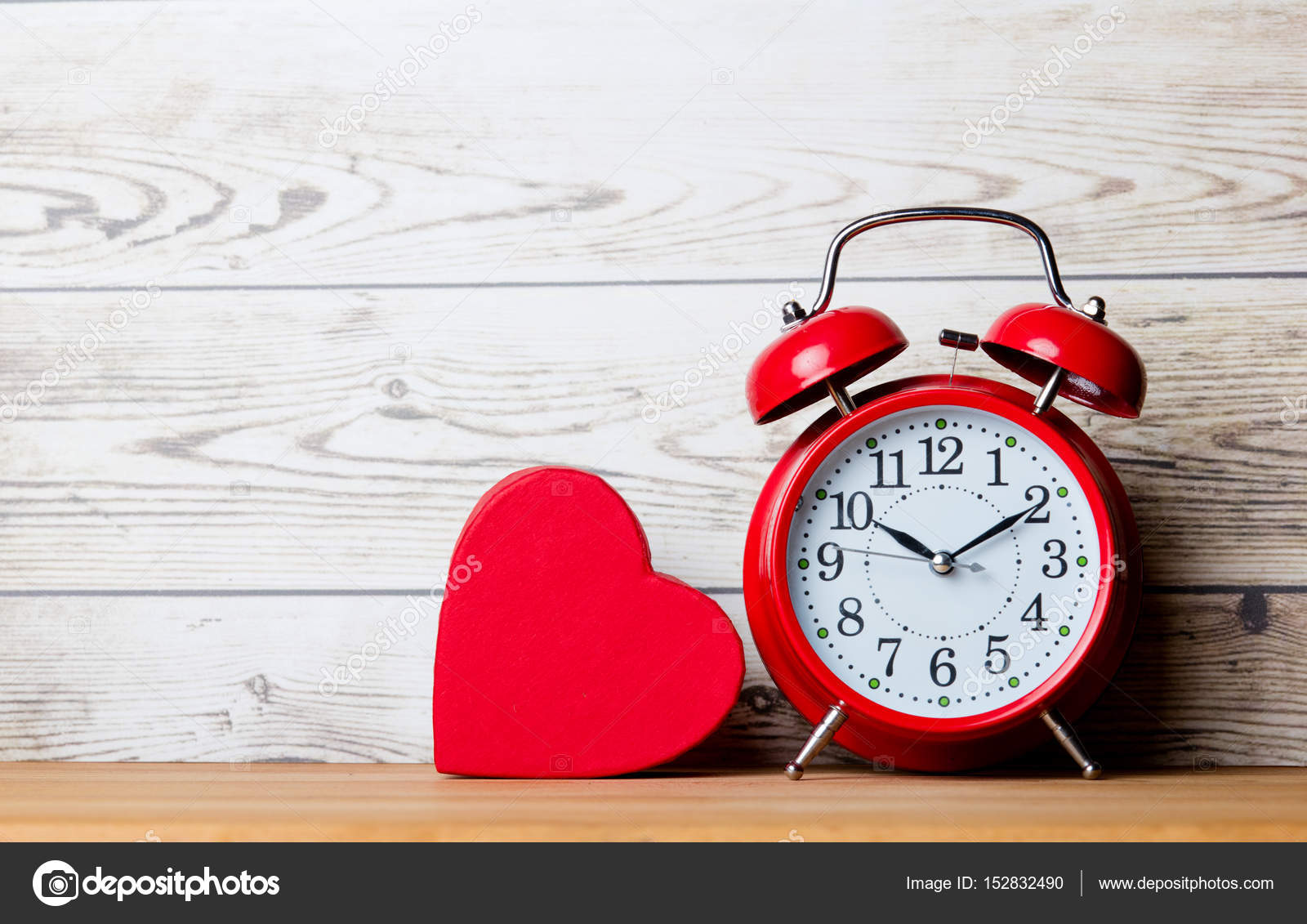 Red heart shape and alarm clock Stock Photo by ©VeraSimon 152832490
