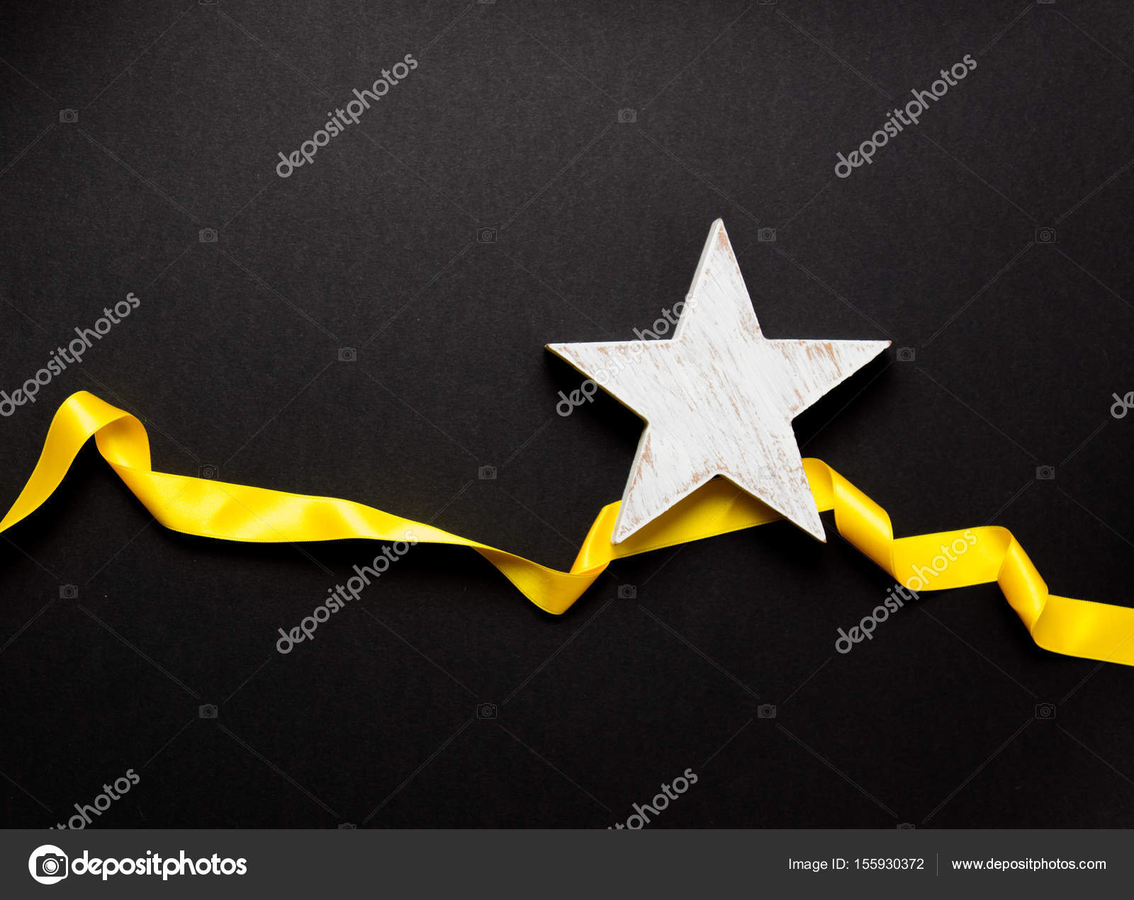 Star and yellow ribbon Stock Photo by ©VeraSimon 155930372