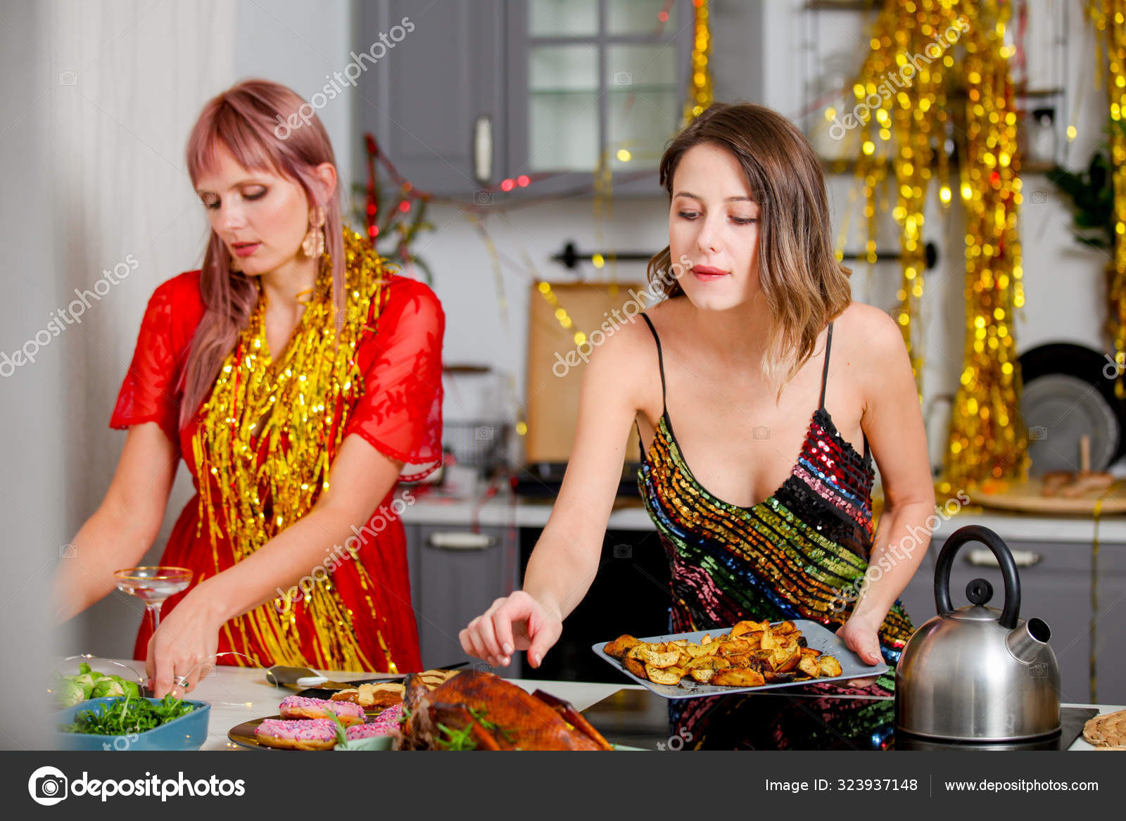 Two Girls Having Fun Kitchen Party Stock Photo by ©VeraSimon 323937148