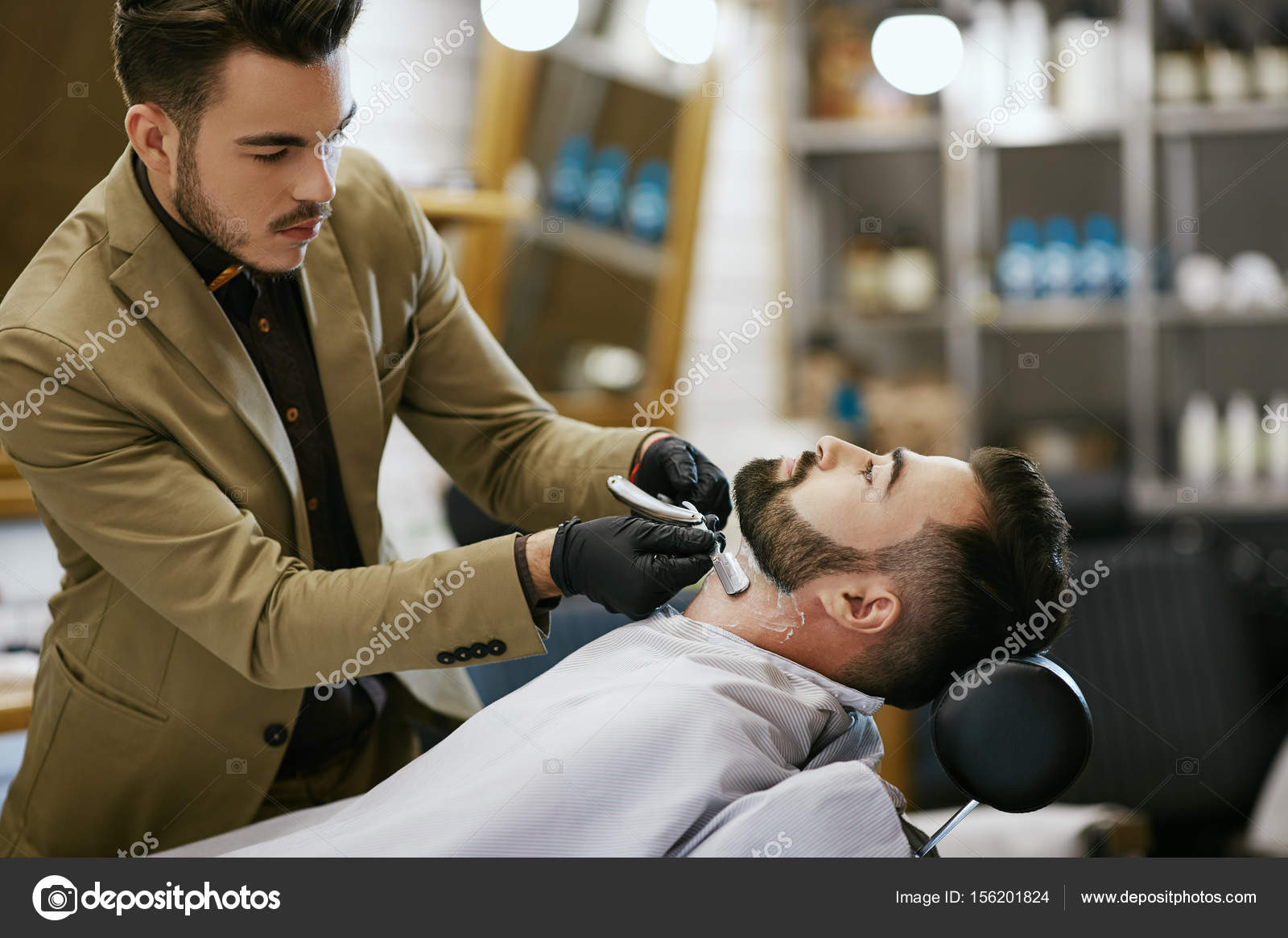 Handsome barber doing job — Stock Photo © VelesStudio #156201824