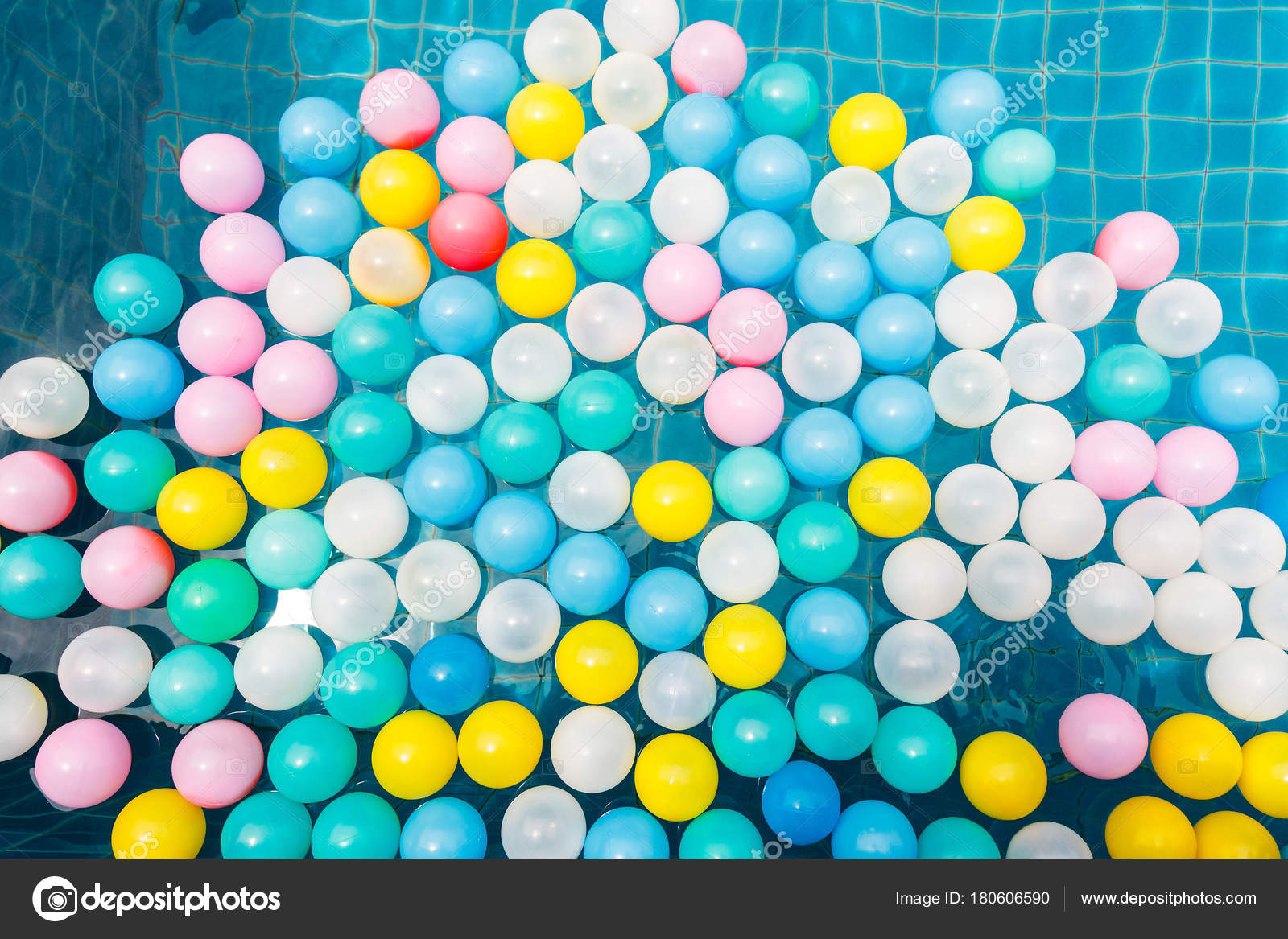Plastic balls in swimming pool. Stock Photo by ©stigmatize 180606590