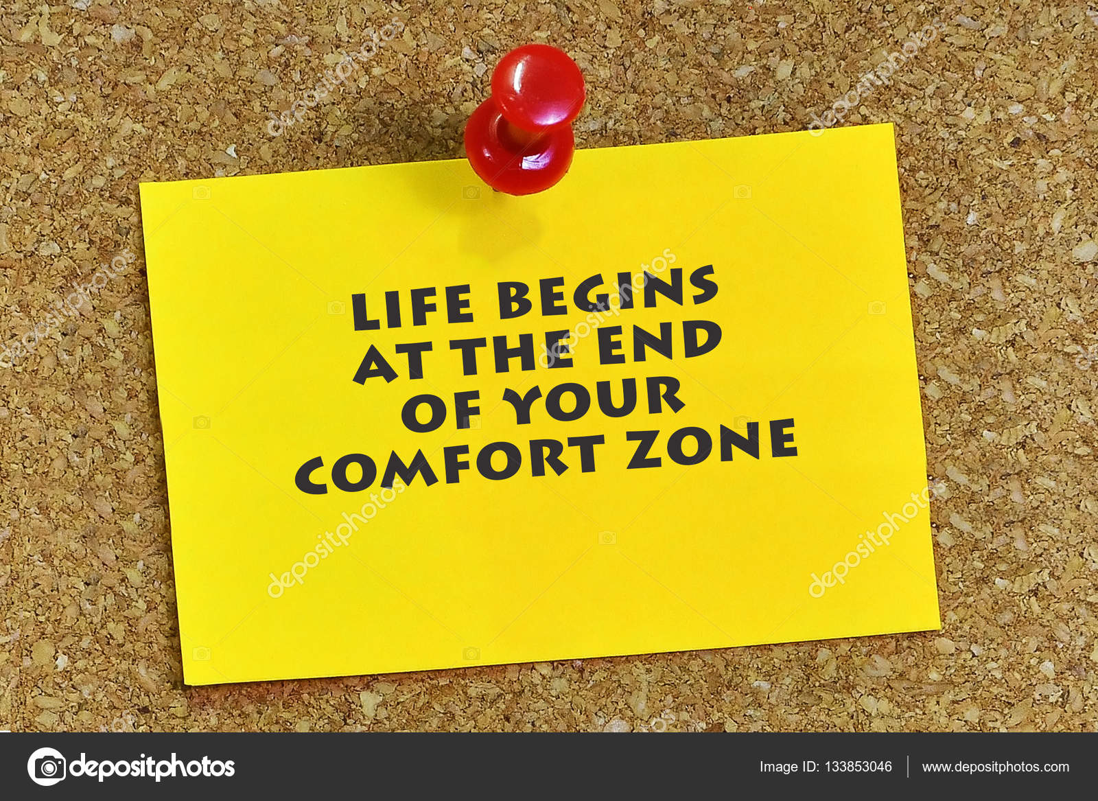 Inspirational motivating quote on sticky note paper with cork ba ...