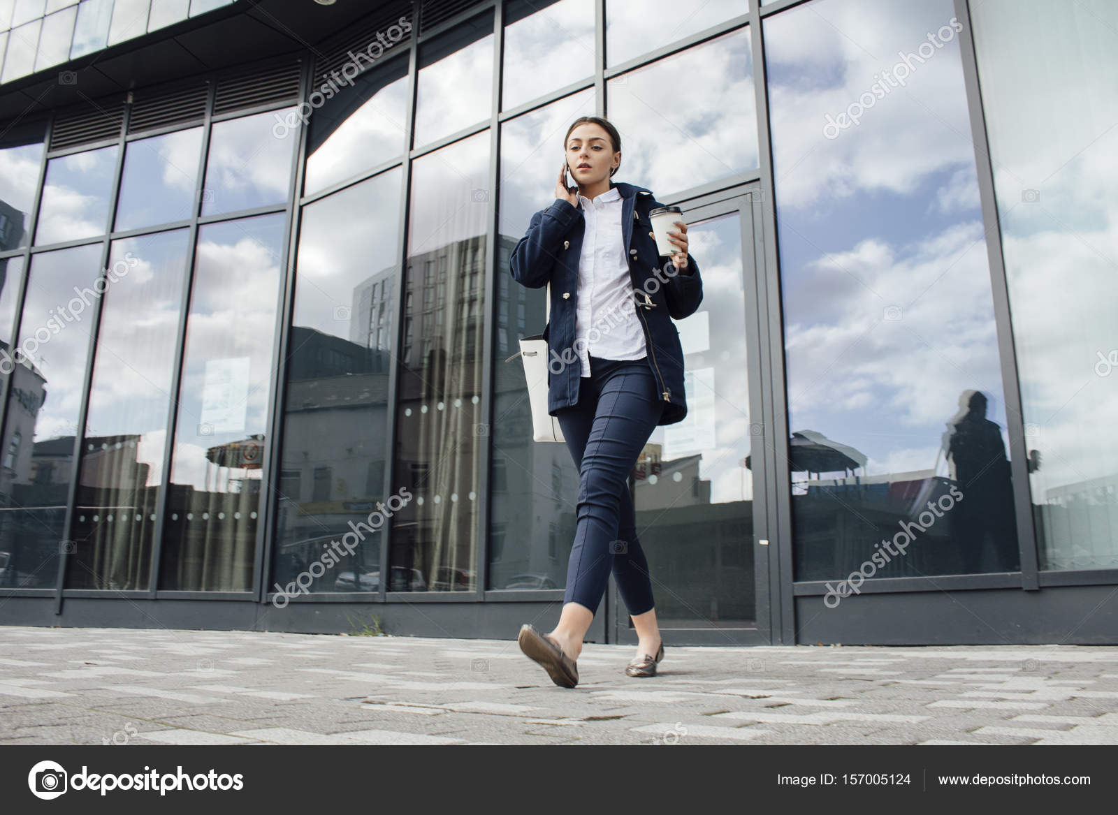 Businesswoman Leaving Work — Stock Photo © DGLimages #157005124