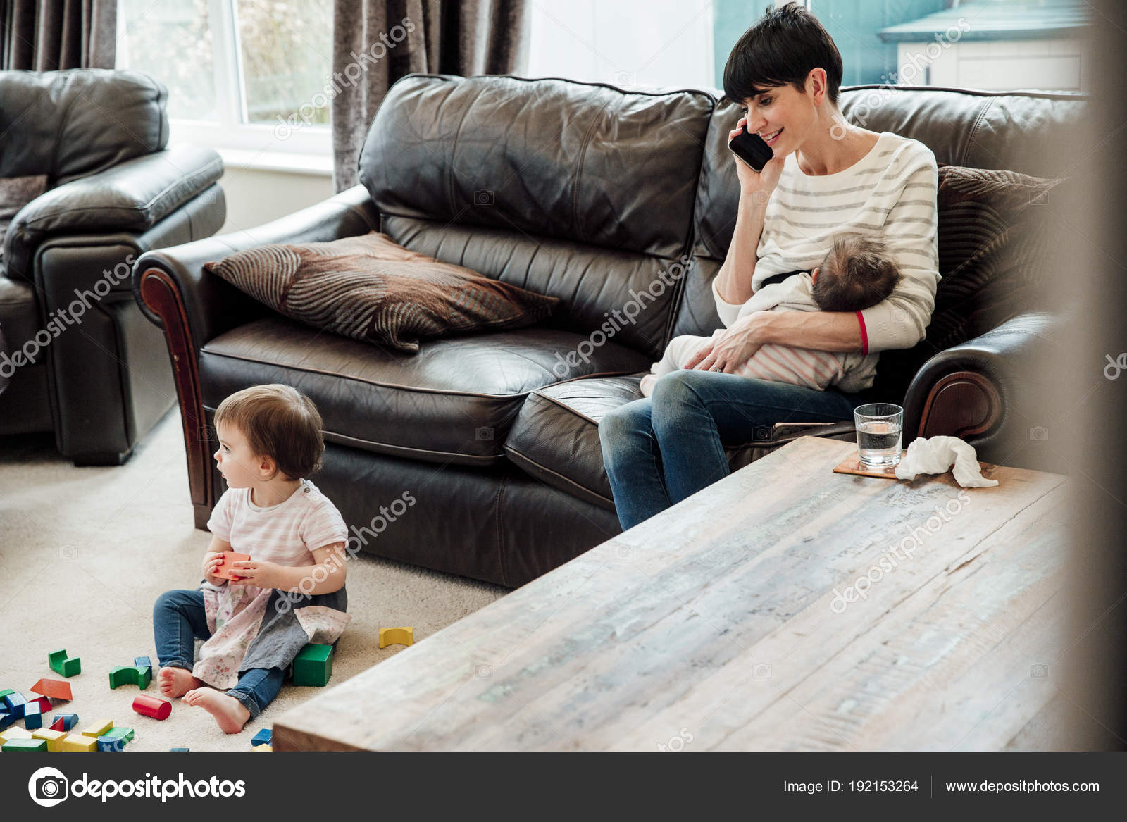 Multitasking Mum at Home Stock Photo by ©DGLimages 192153264