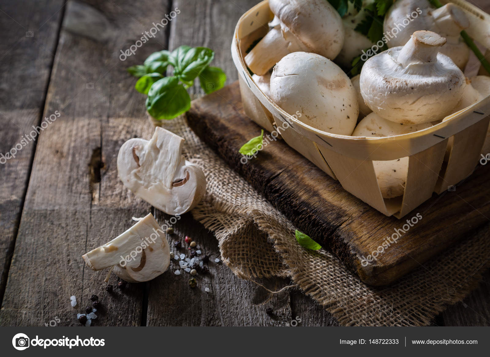 Mushrooms on rustic wood background Stock Photo by ©anaumenko 148722333