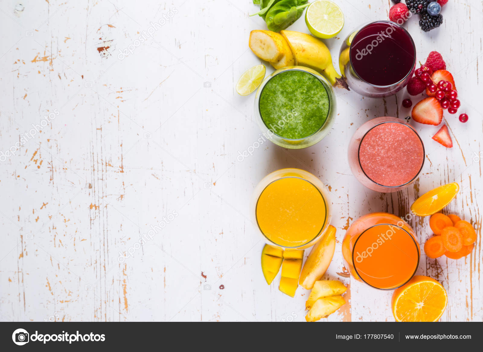 Selection of colourful smoothies on rustic wood background — Stock ...