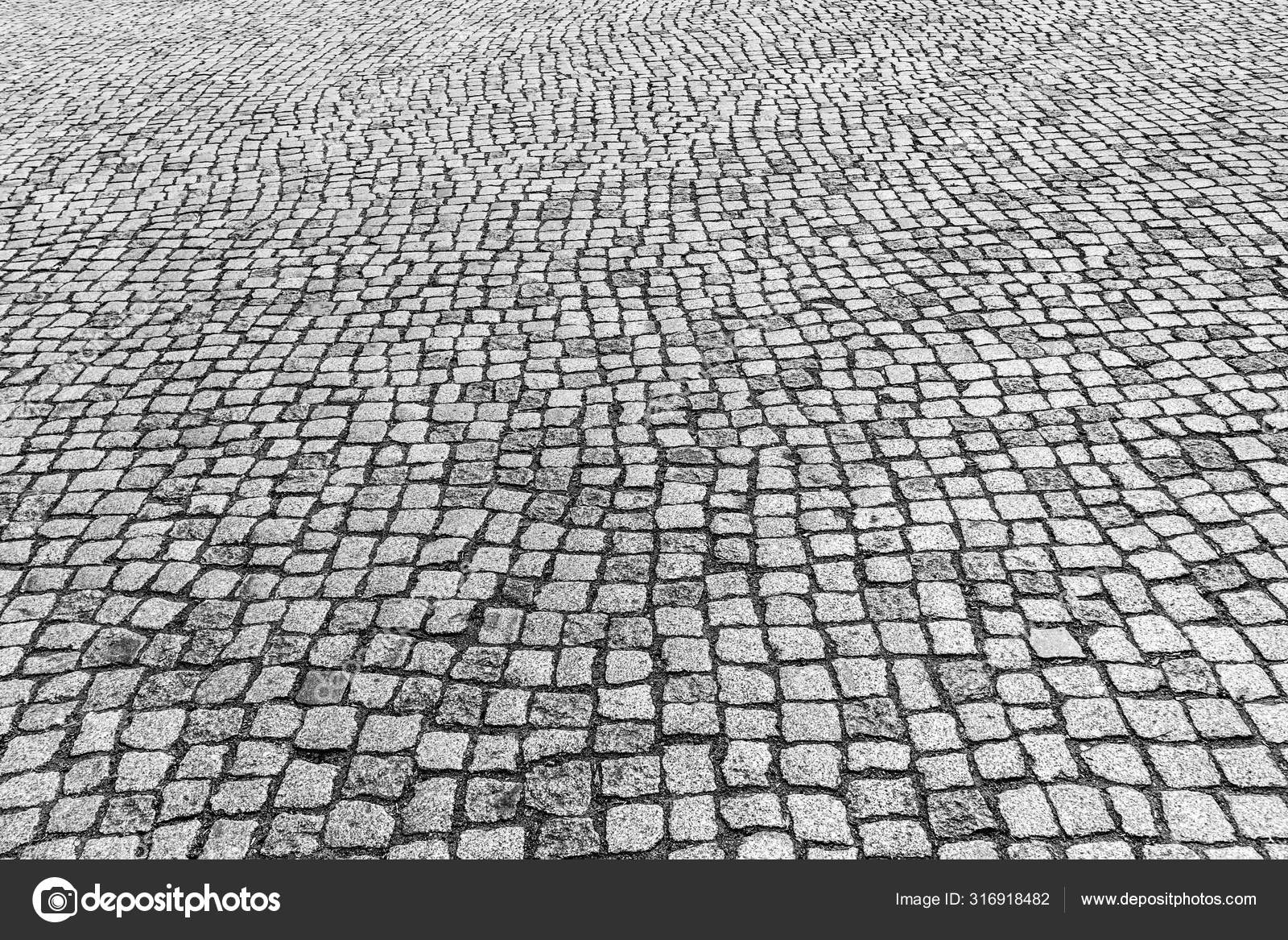 Old pavement of granite texture. Stock Photo by ©yemelyanov 316918482