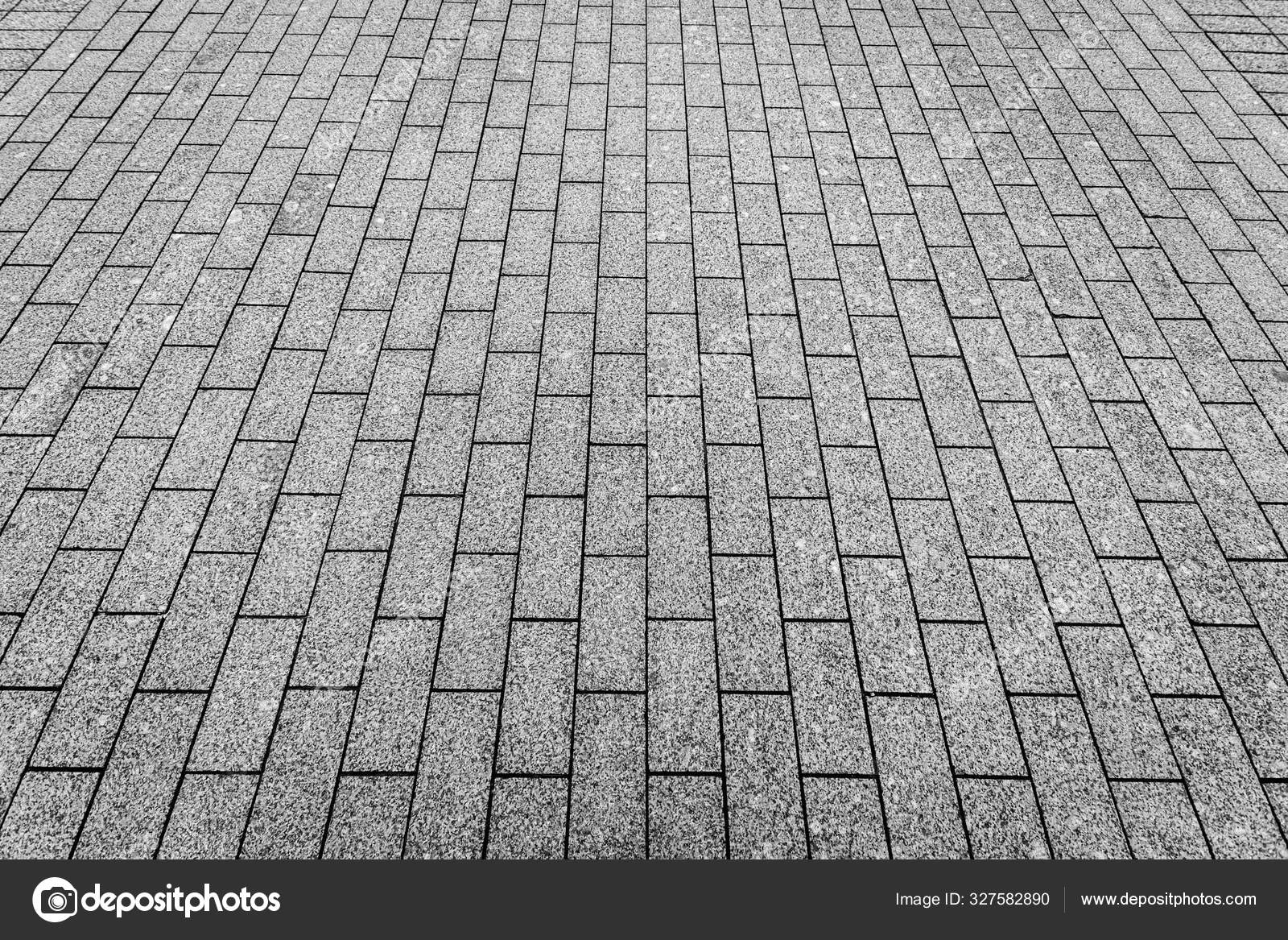Top view on paving stone road. Old pavement of granite texture. — Stock ...