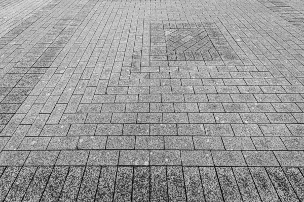 Top view on paving stone road. Old pavement of granite texture. — Stock ...